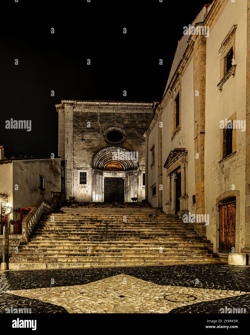 the historic center of Pescocostanzo at night with the facade of the ...