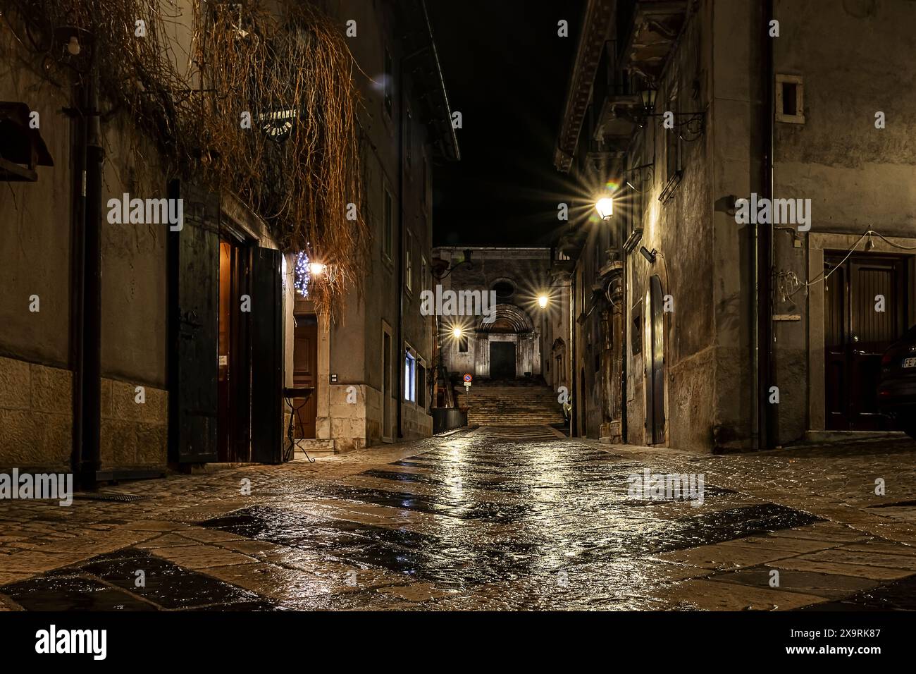 the historic center of Pescocostanzo at night with the facade of the ...