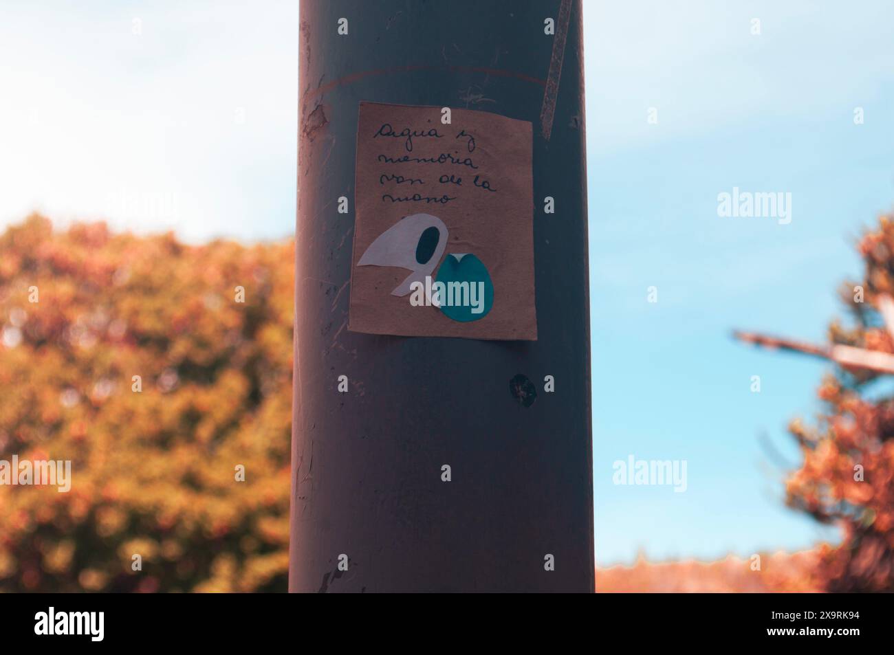 A street photograph from Montevideo featuring a small hand-drawn poster ...