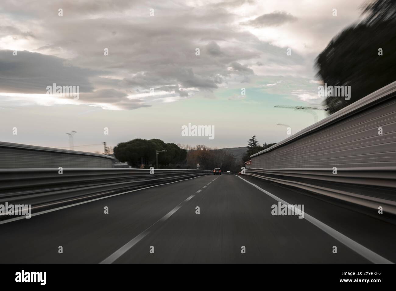 an empty and boring highway in central Italy photographed with the ...