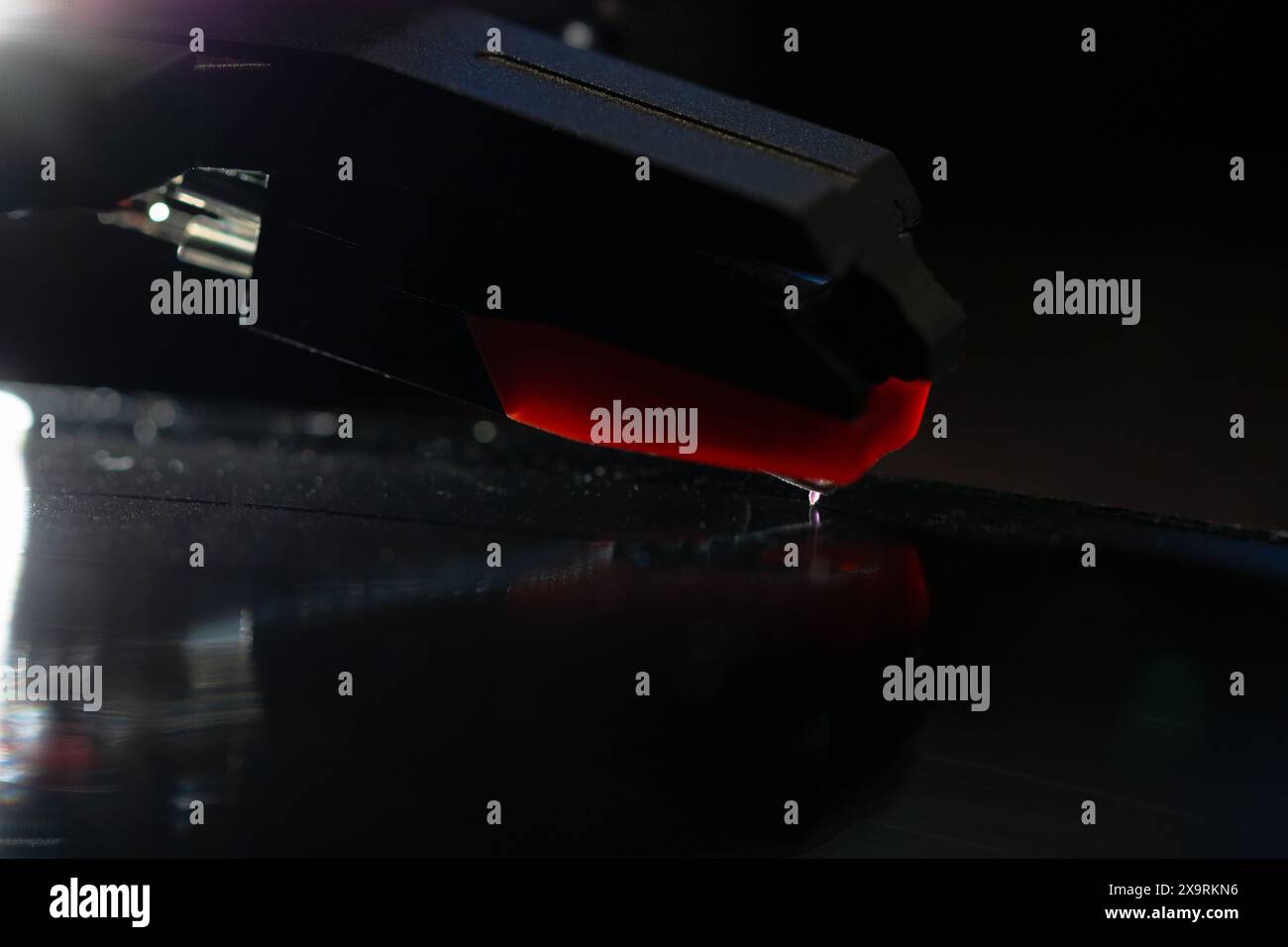 vinyl record with clear sound tracks and stylus, focus on sound tracks ...