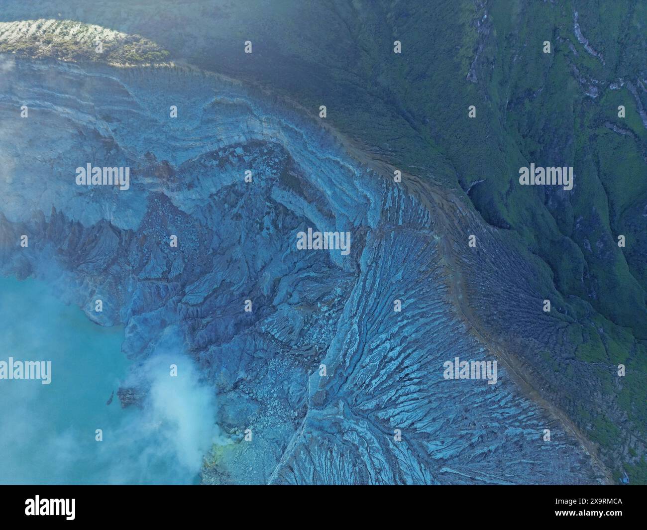Breathtaking aerial view of majestic Ijen volcano crater mountain range ...