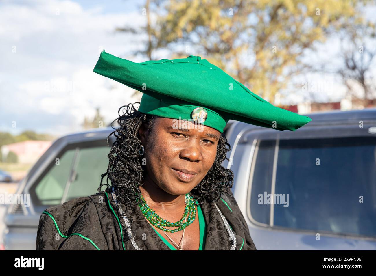 Namibia, Omaheke Region, Gobabis, Herero woman wear the cow horn shaped ...