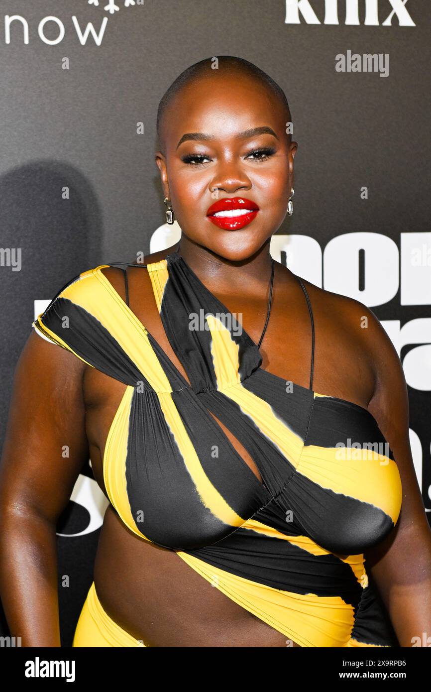 Achieng Agutu attends the Sports Illustrated swimsuit runway show in ...