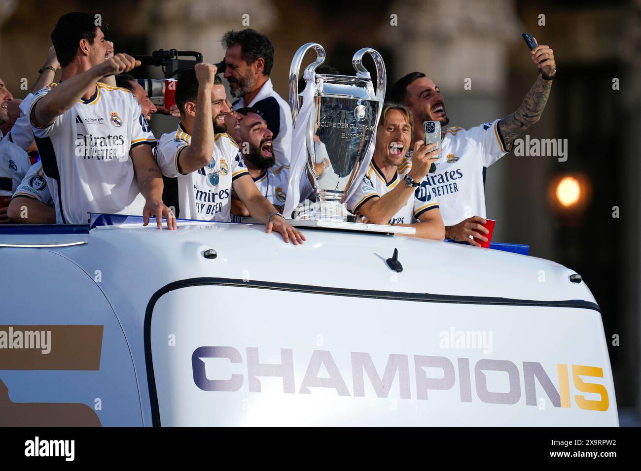 Real Madrid players celebrate during the Champions League trophy parade ...