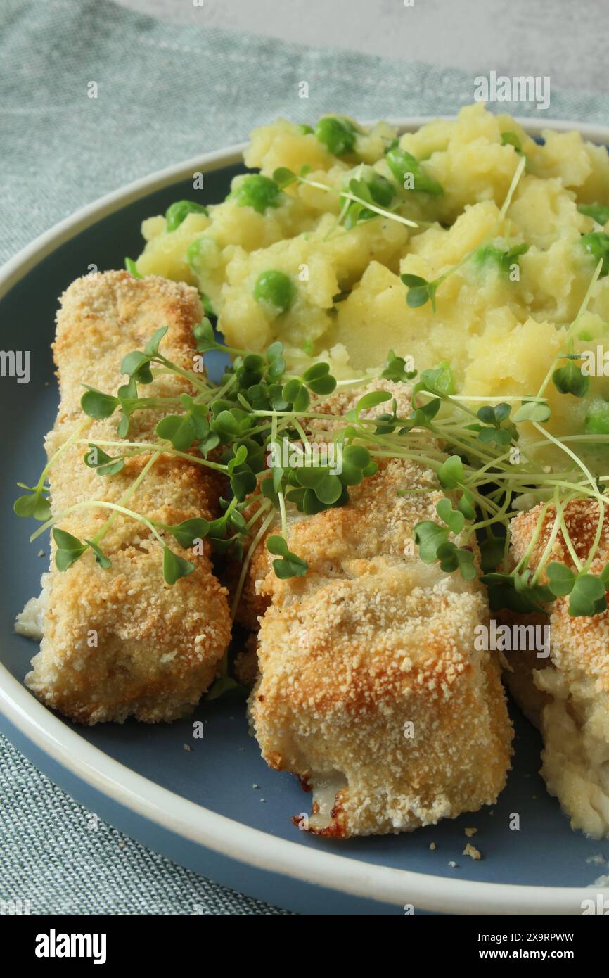 Homemade Fish Sticks with Mashed Potatoes and Peas Stock Photo - Alamy
