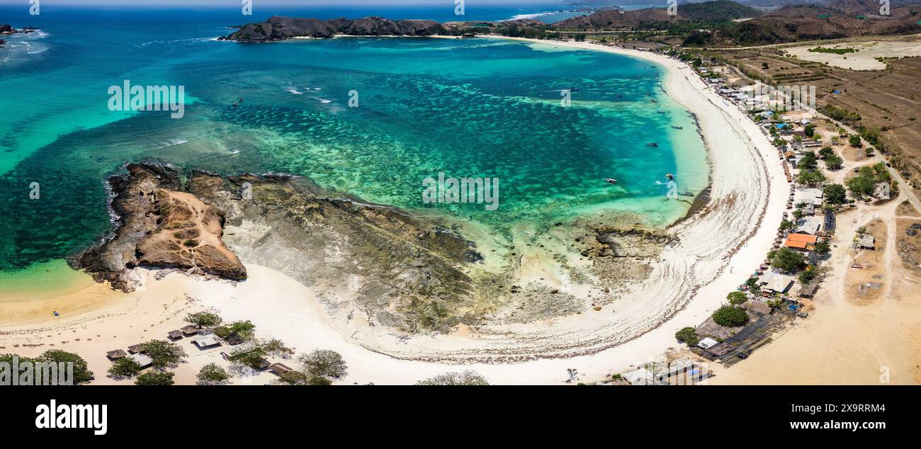 Panoramic aerial view of a stunning tropical beach inside a sheltered ...