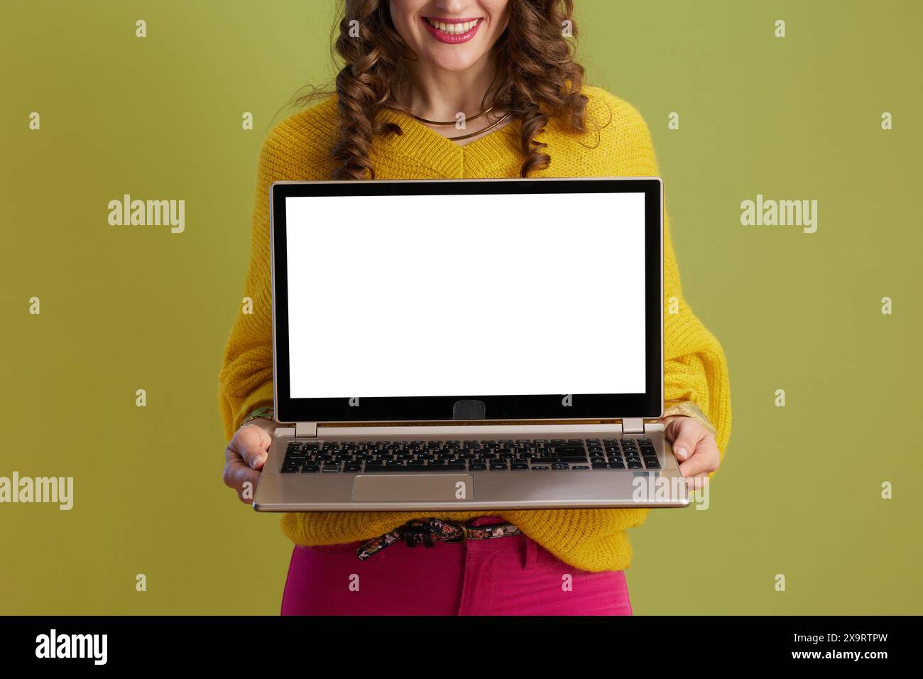 Woman in green sweater showing hi-res stock photography and images - Alamy