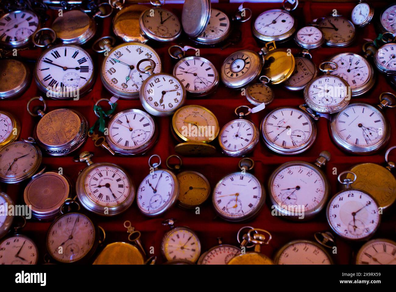 Vintage pocket watches on display in antique store. Collection Stock ...