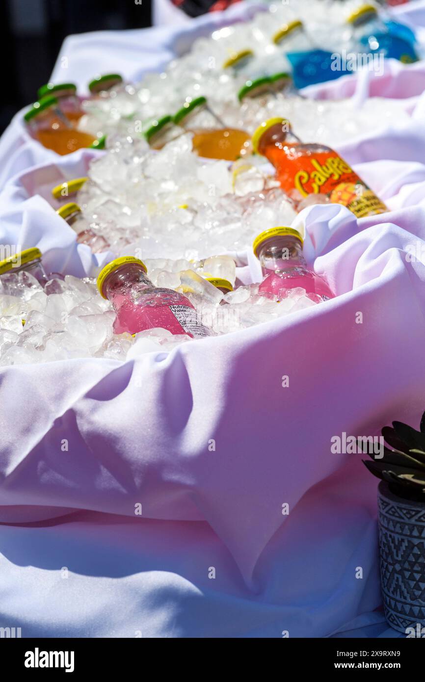 Ice cold bottled drinks in an ice bucket Stock Photo - Alamy