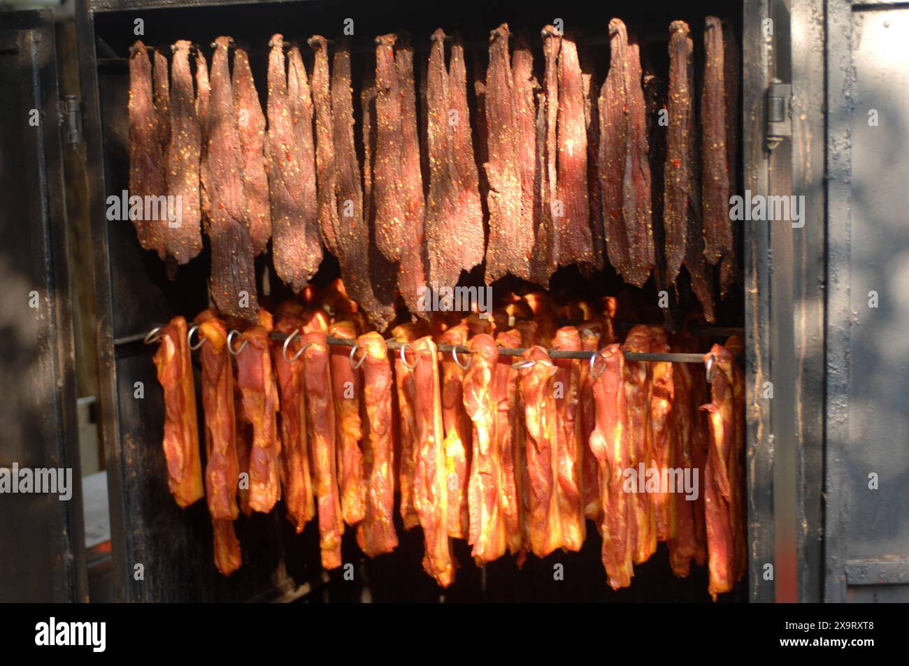 Dried buffalo meat hanging in a smoking cabinet, Cat Cat village, Sapa ...