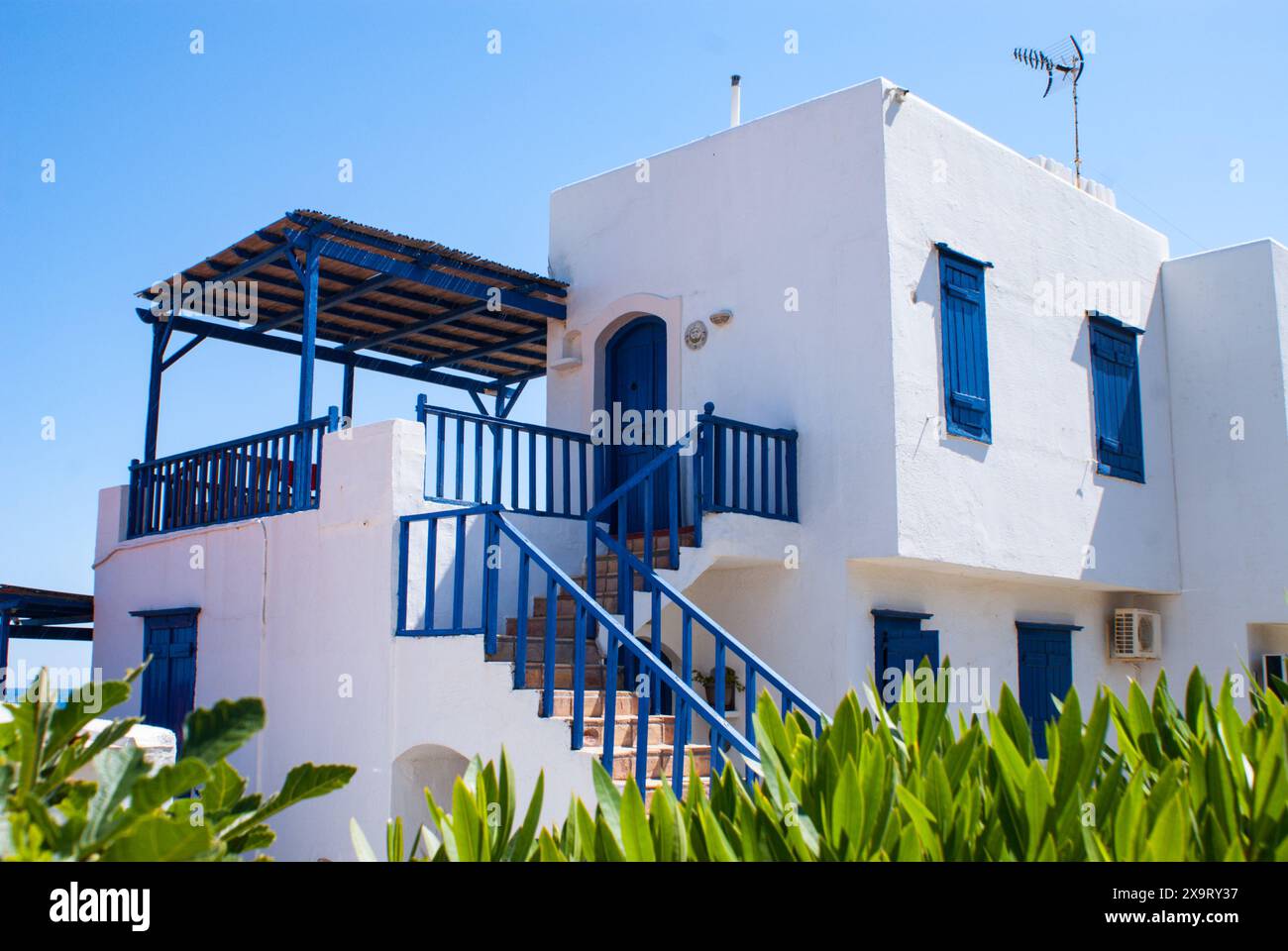 Blue and white traditional Greek private house on the island of Crete ...