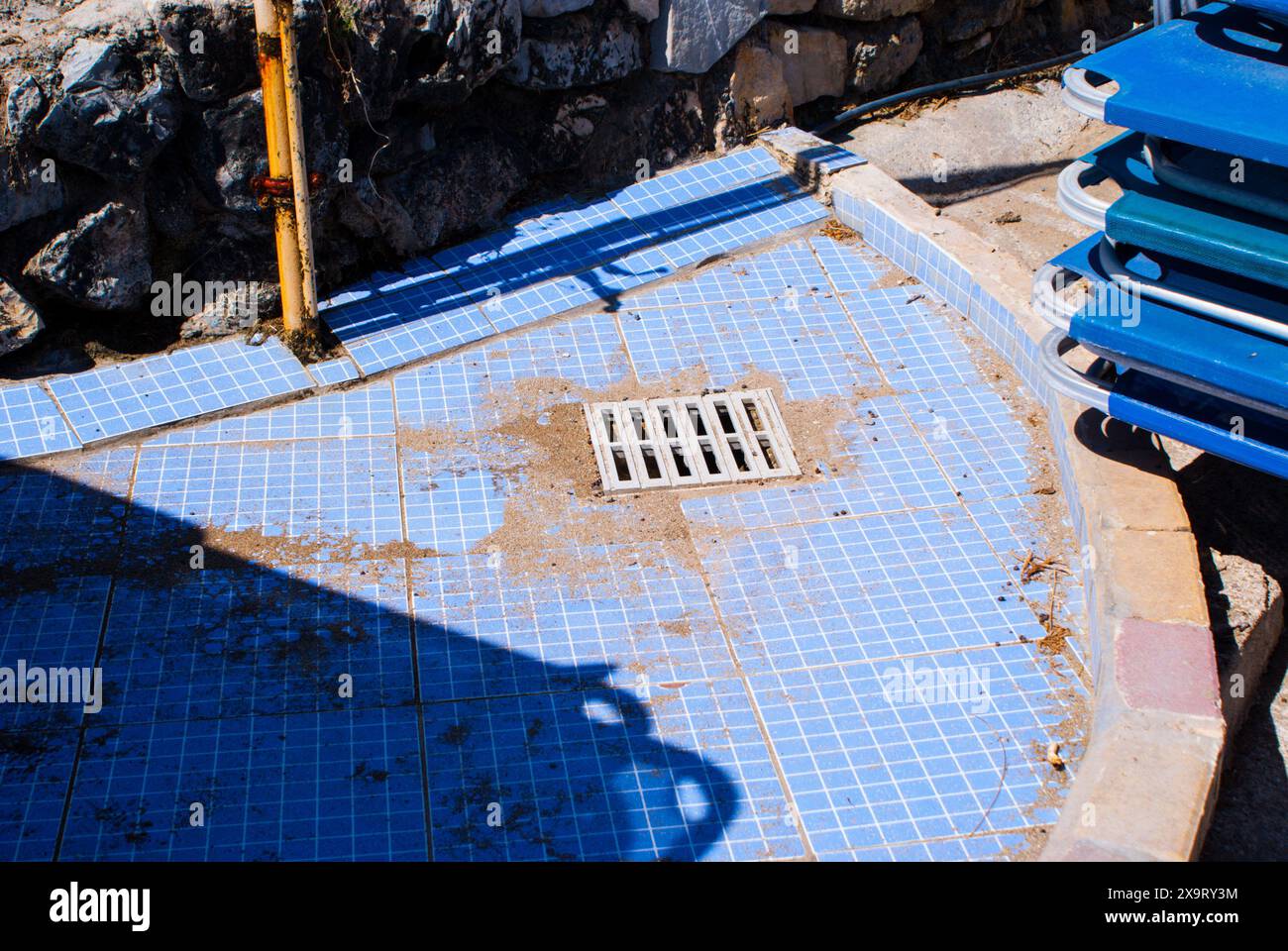 Dry dirty bottom of a hotel pool before the opening of the season Stock ...