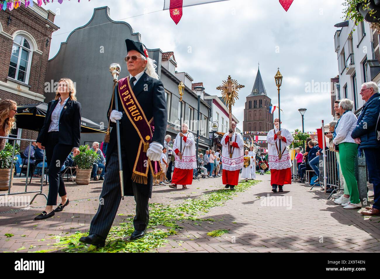 A man leads the beginning of the procession during the "Boxmeerse Vaart ...