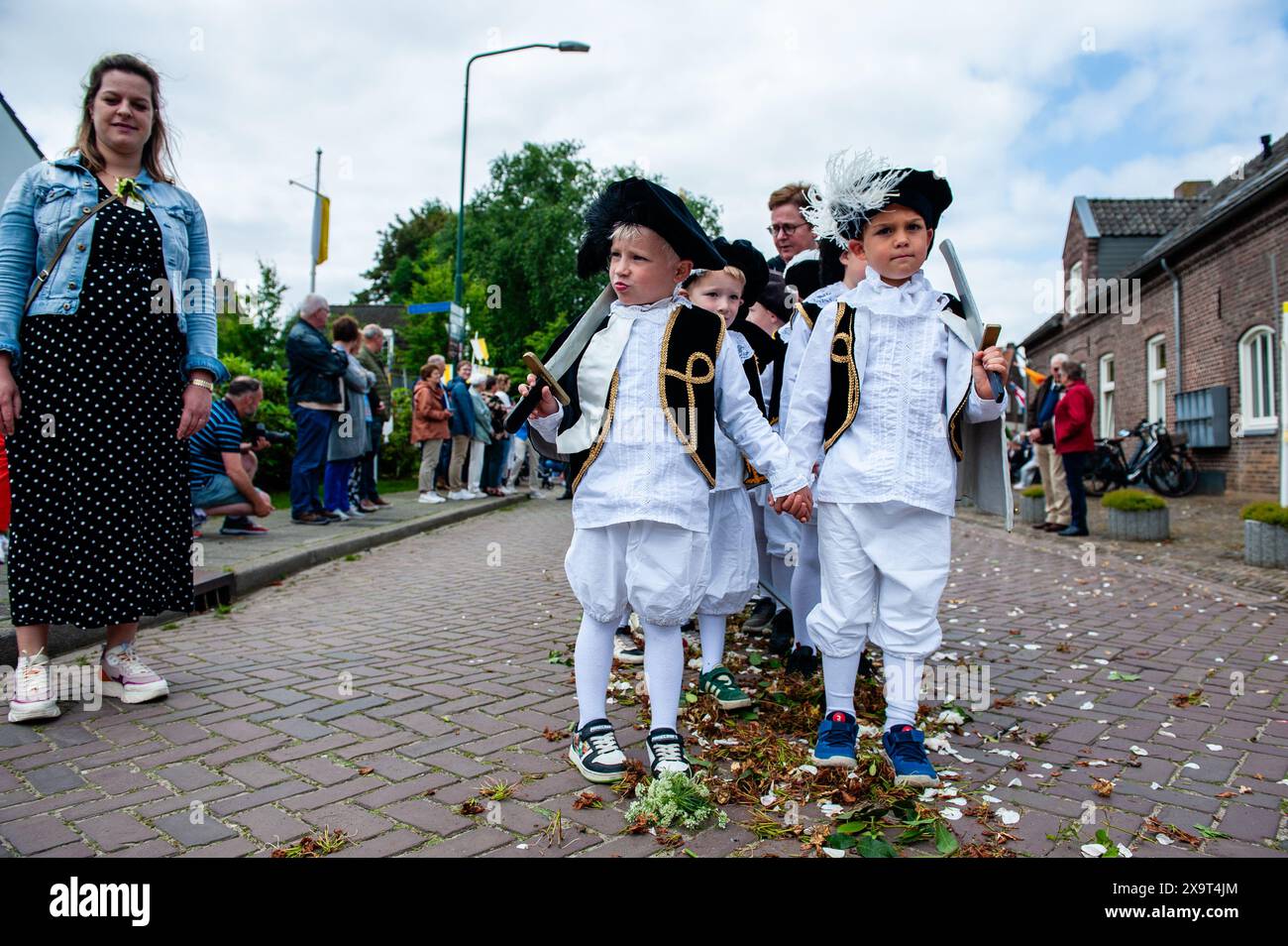 A group of kids walks hand in hand during the "Boxmeerse Vaart ...
