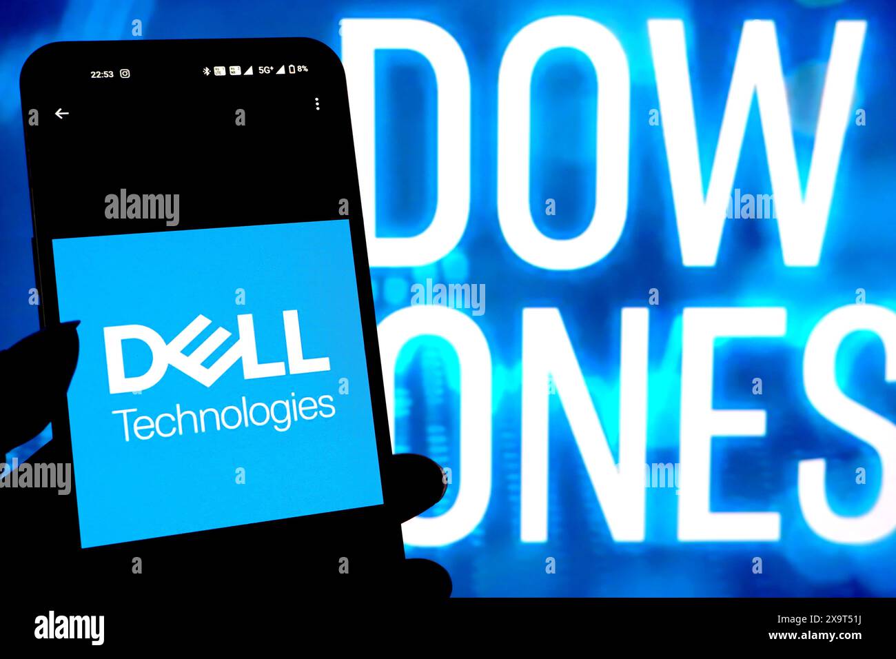 In this photo illustration, a Dell Technologies logo seen displayed on ...