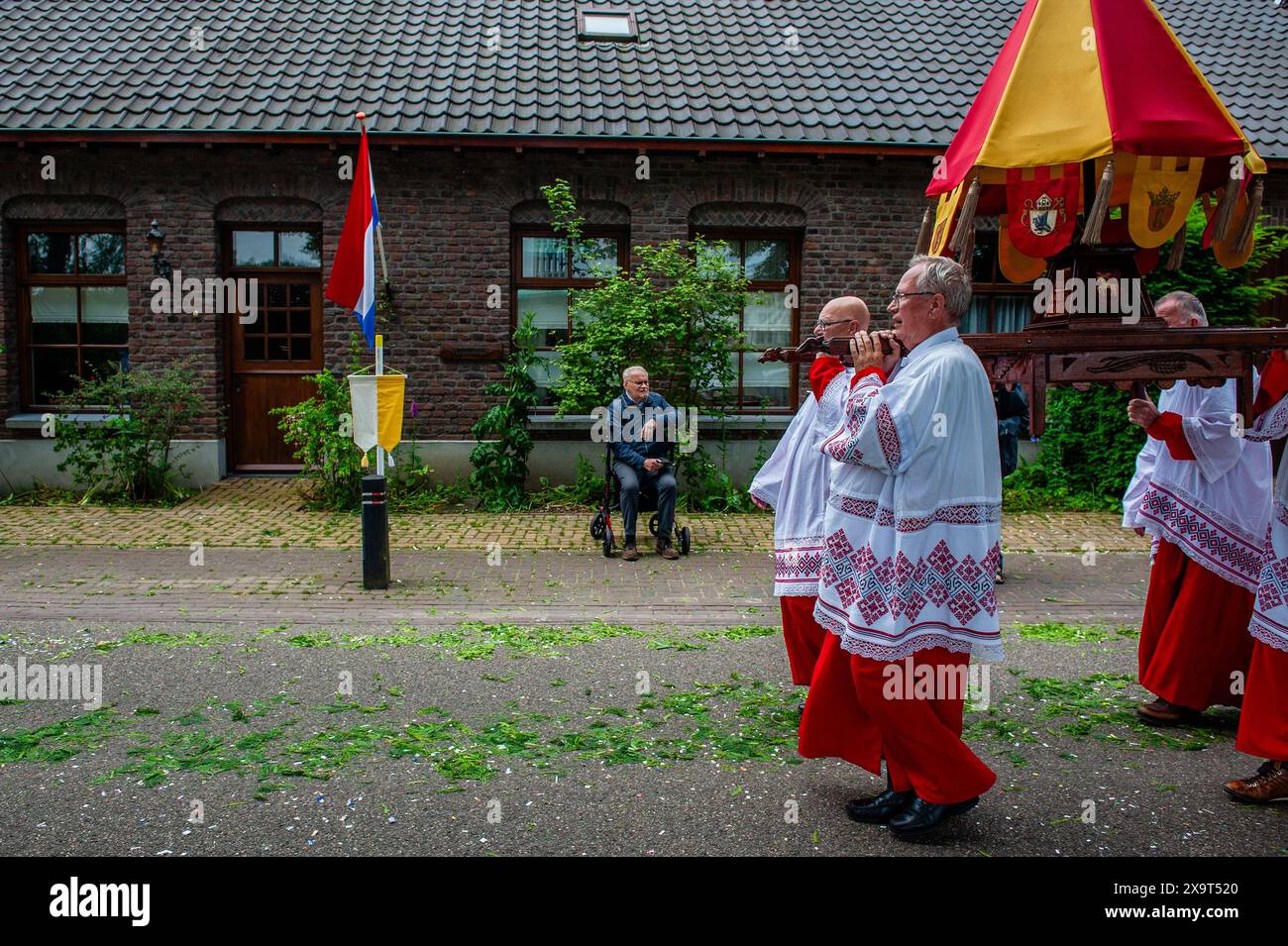 A man watches the procession during the "Boxmeerse Vaart", ancient Holy ...