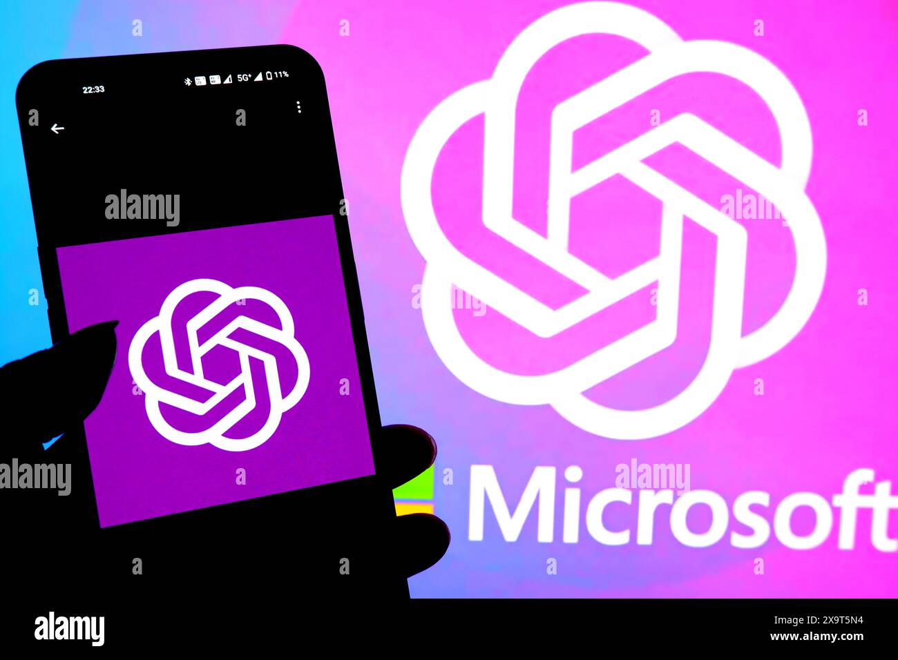 In this photo illustration, an Open AI logo seen displayed on a ...