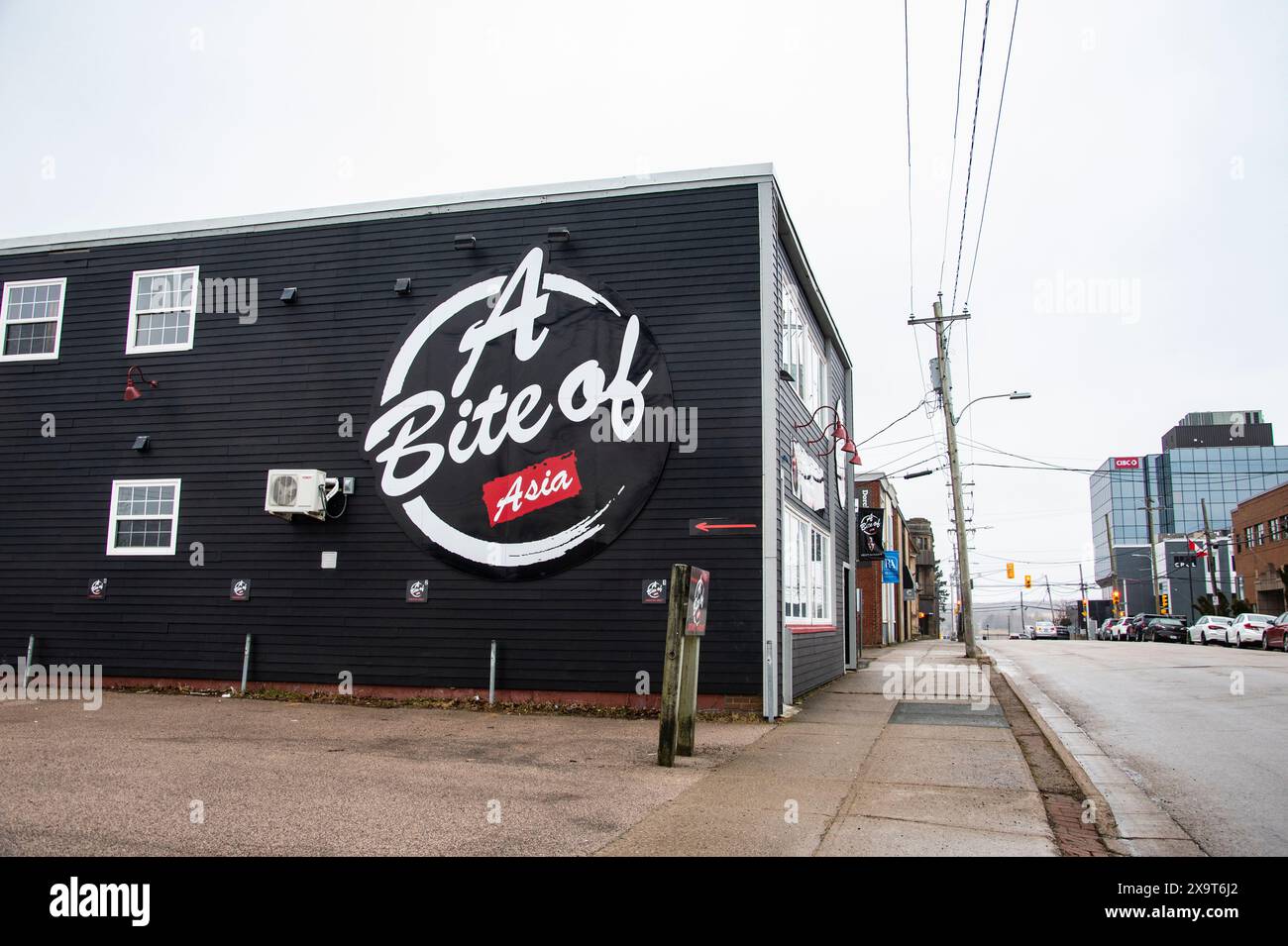 A Bite of Asia sign in downtown Sydney, Nova Scotia, Canada Stock Photo ...
