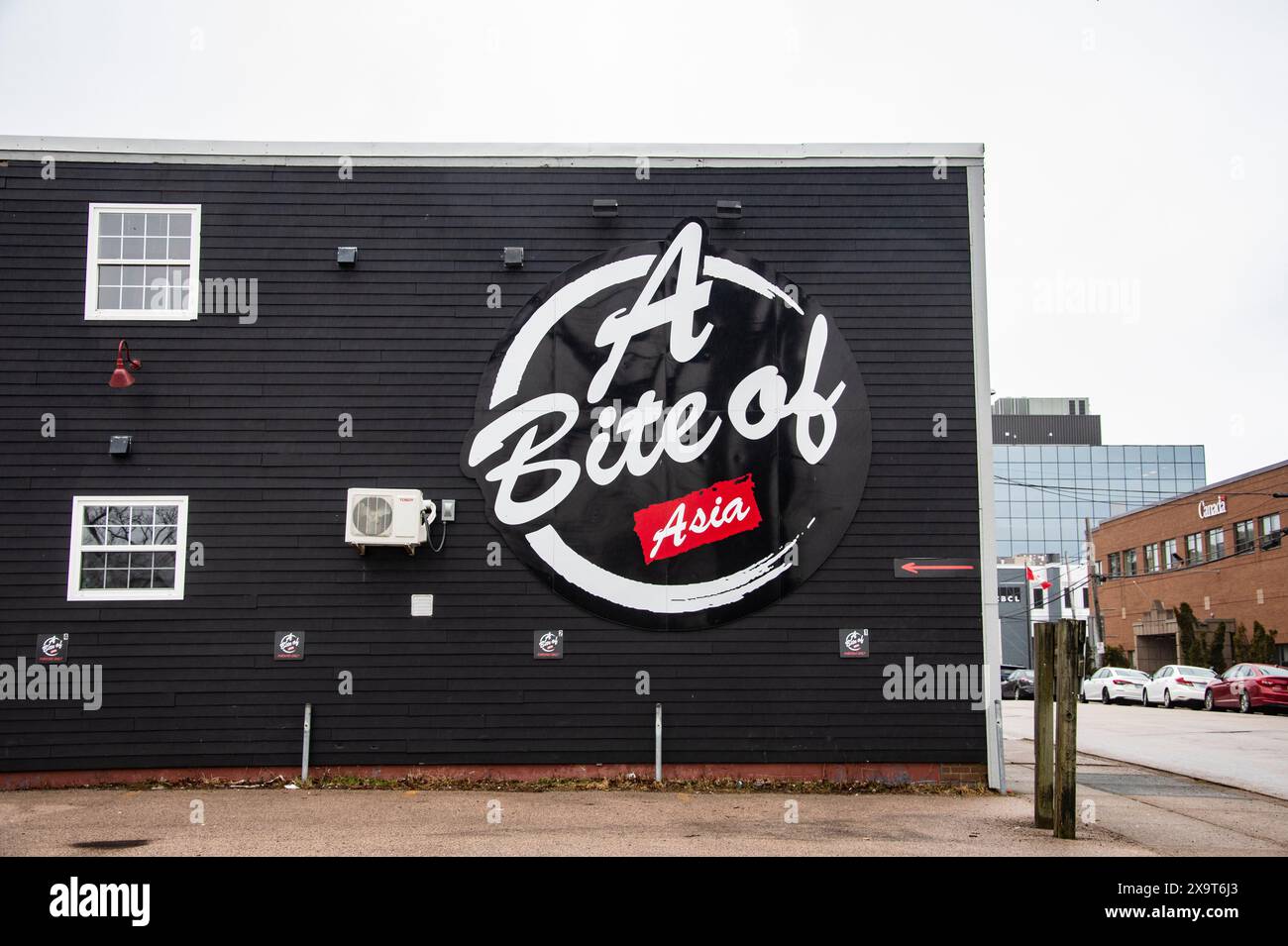 A Bite of Asia sign in downtown Sydney, Nova Scotia, Canada Stock Photo ...