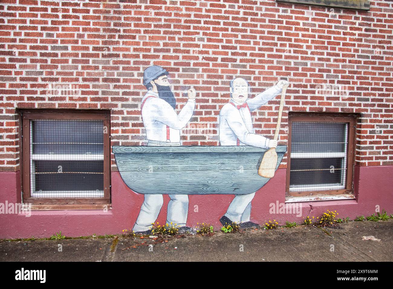 Two men paddling a boat mural in downtown Sydney, Nova Scotia, Canada ...