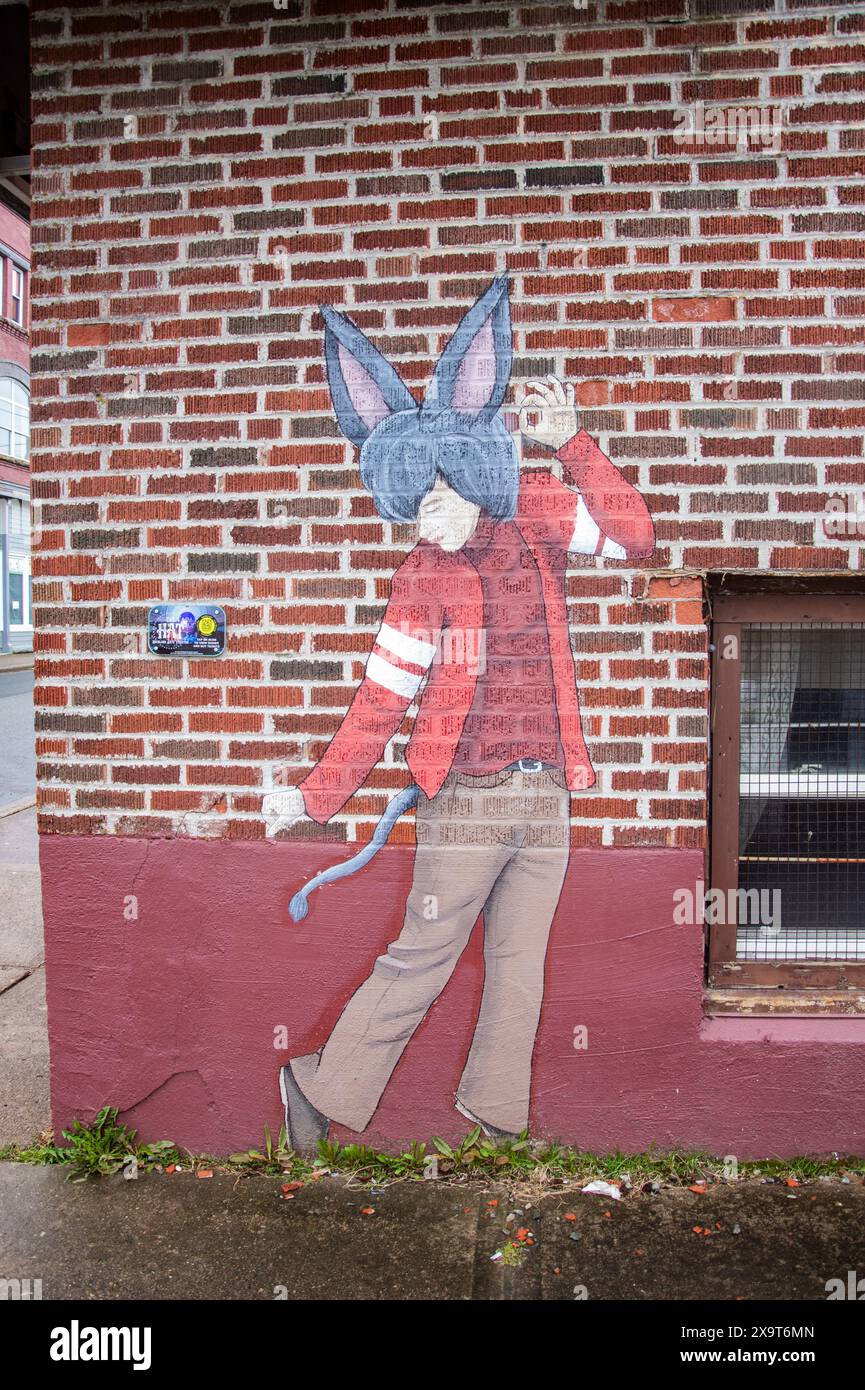 Boy wearing rabbit ears mural in downtown Sydney, Nova Scotia, Canada ...