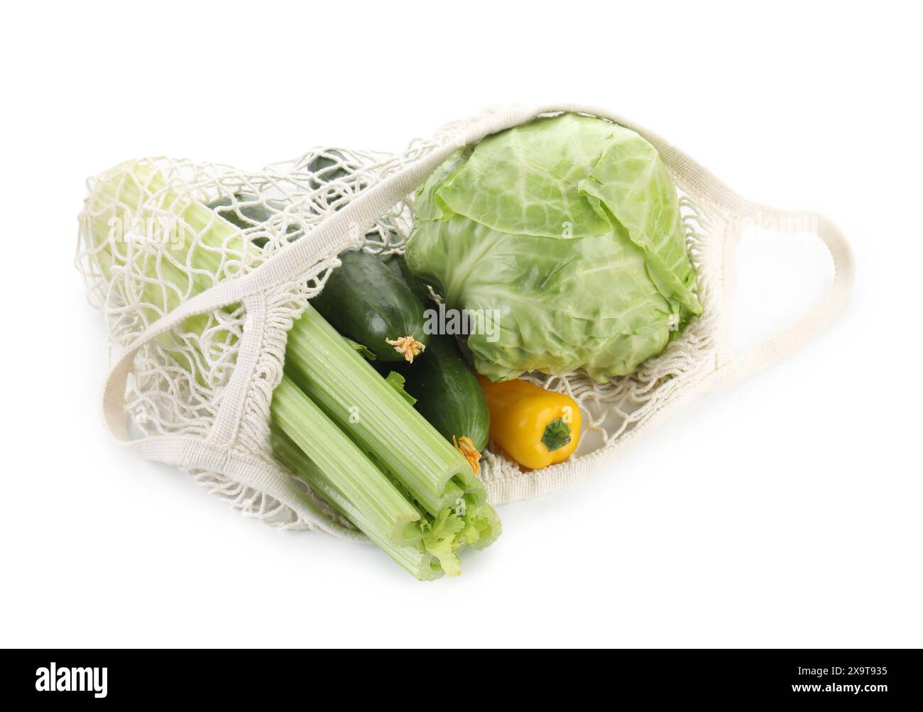 String bag with different vegetables isolated on white Stock Photo - Alamy