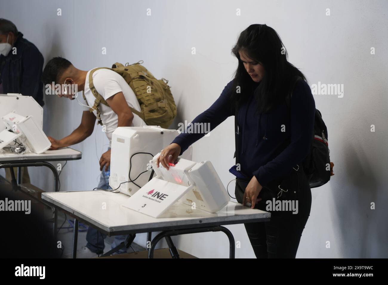 Mexico City, Mexico. 02nd June, 2024. A Mexican citizen casting their ...