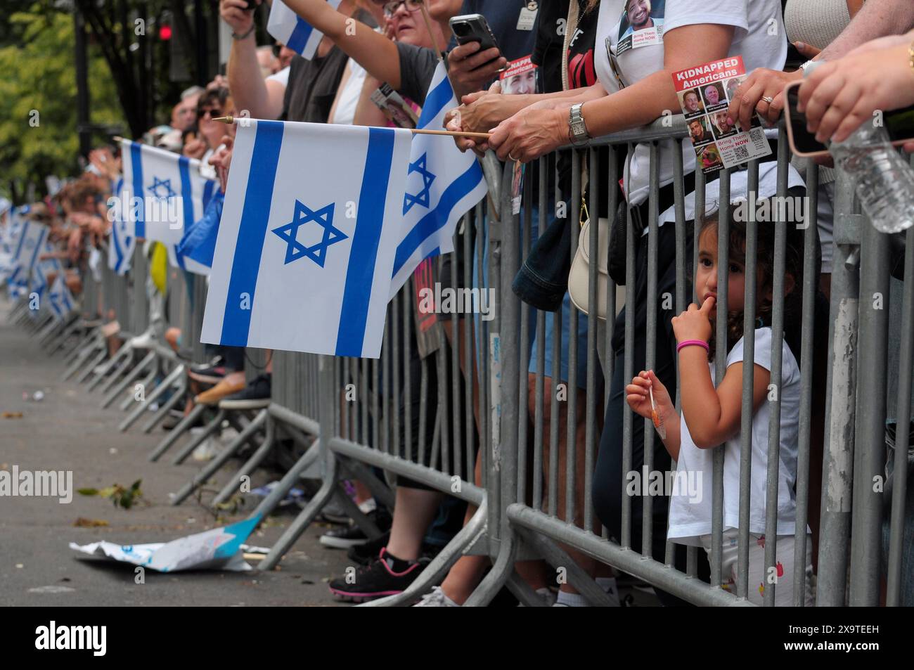 Revelers wave Israeli flags on Fifth Avenue at the 59th annual Israel ...