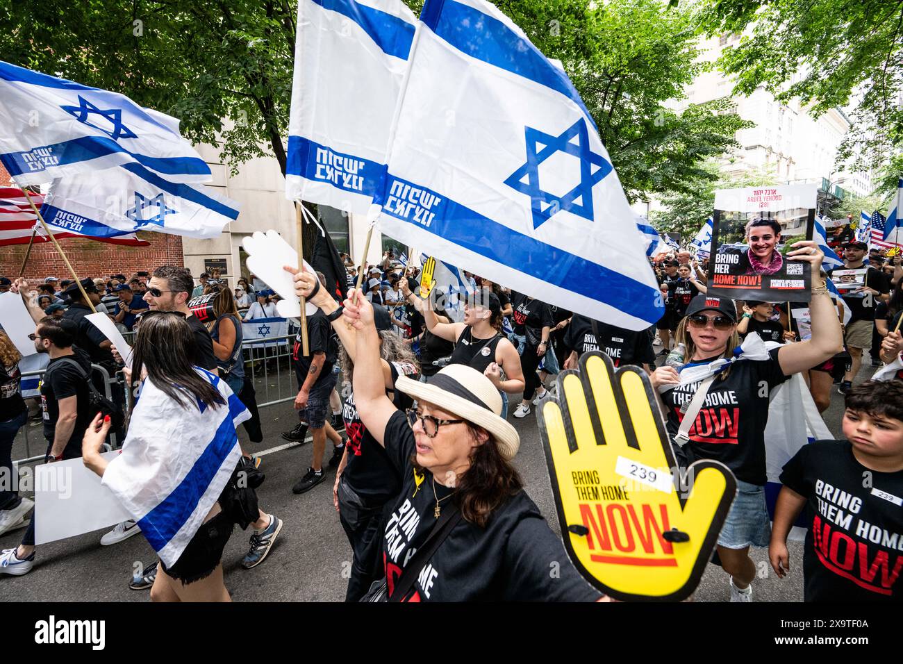 New York, United States. 02nd June, 2024. Marchers hold Israeli flags ...