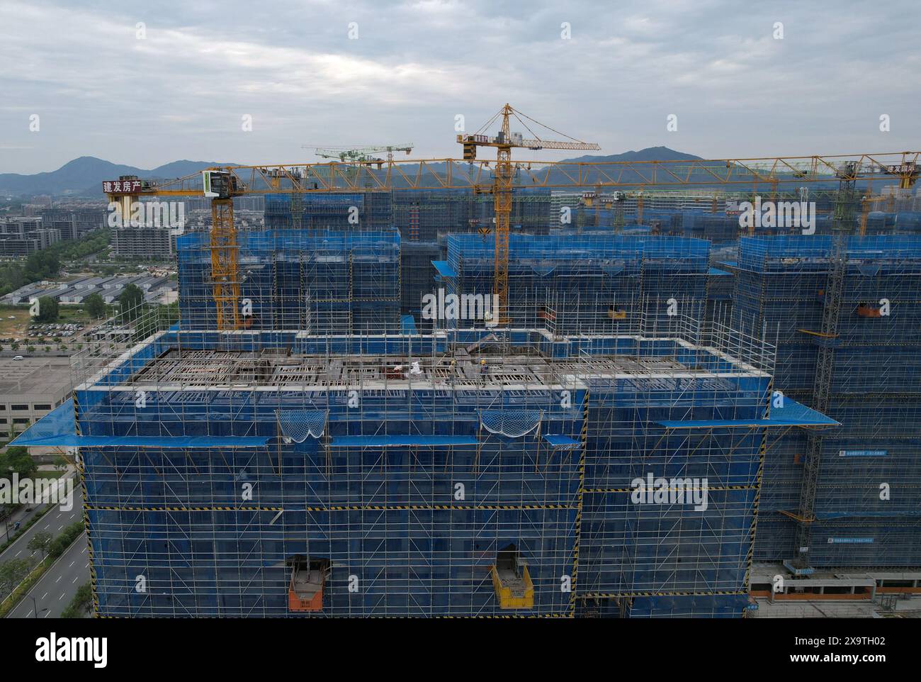 HANGZHOU, CHINA - JUNE 3, 2024 - Aerial photo shows a building under ...