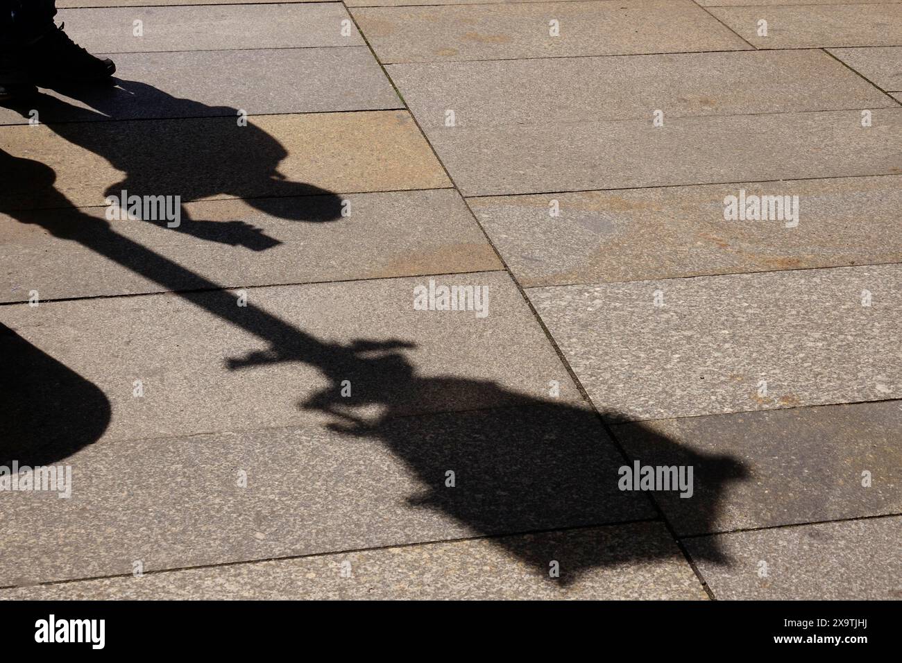 Man taking a selfie with a mobile phone, Shadow, Germany Stock Photo ...