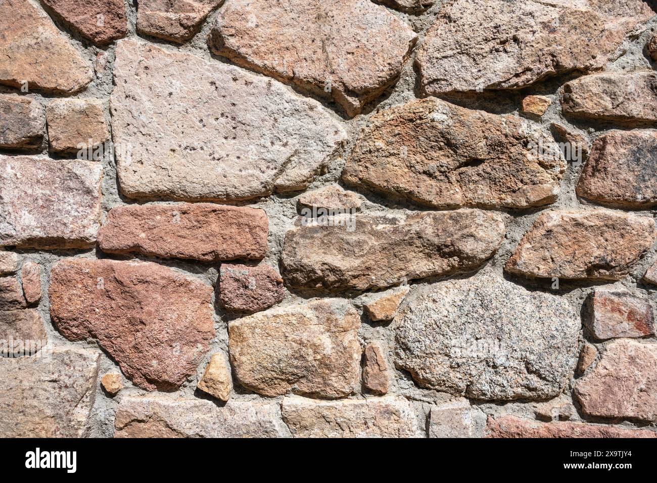 Various types of stone as a building material, stone wall, format ...