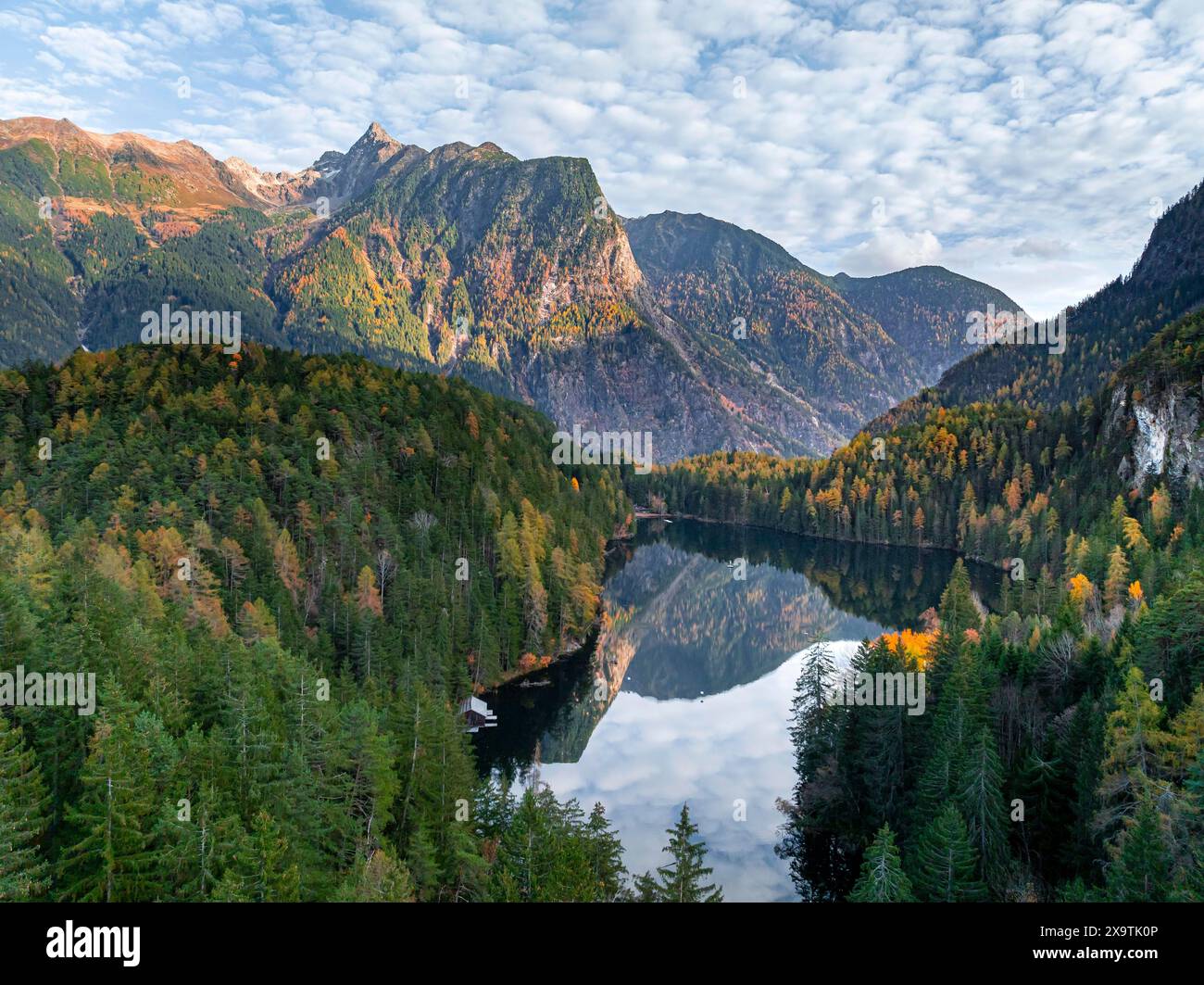 Aerial view, mountain peaks of the Oetztal Alps reflected in Lake ...