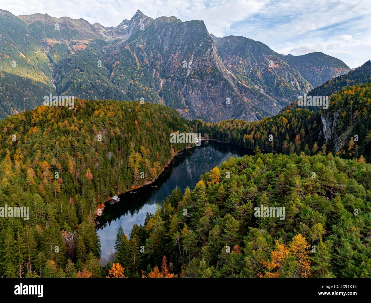 Aerial view, mountain peaks of the Oetztal Alps reflected in Lake ...