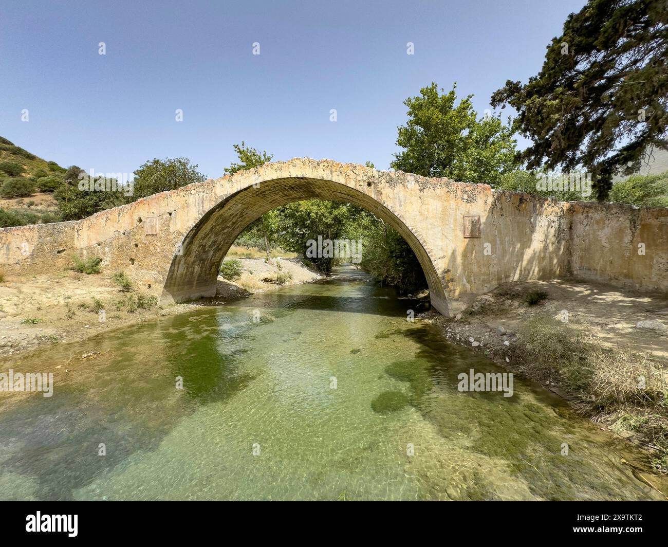 Frontal view of historic classical arched stone bridge in Venetian ...