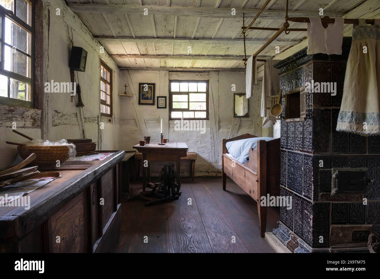 Living area of a traditionally built, old day labourer's house, late ...