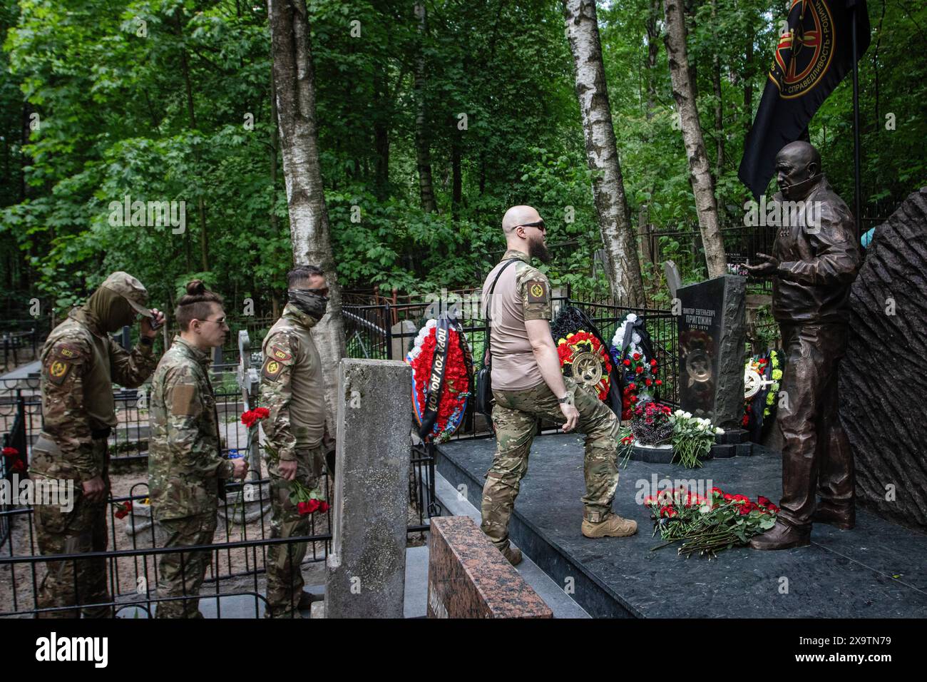 Soldiers of the Wagner PMC lined up near the installed sculpture of the ...