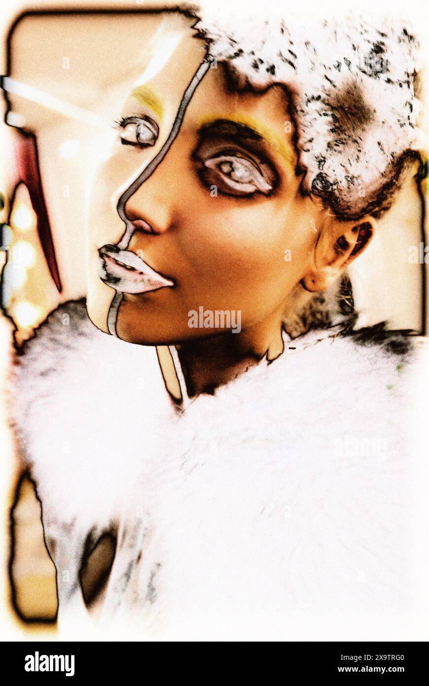 Unusual makeup, a bold line down the middle face at fashion parade. A ...