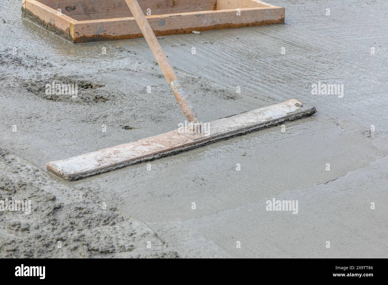detail of equalizing the foundation liquid concrete at the construction ...
