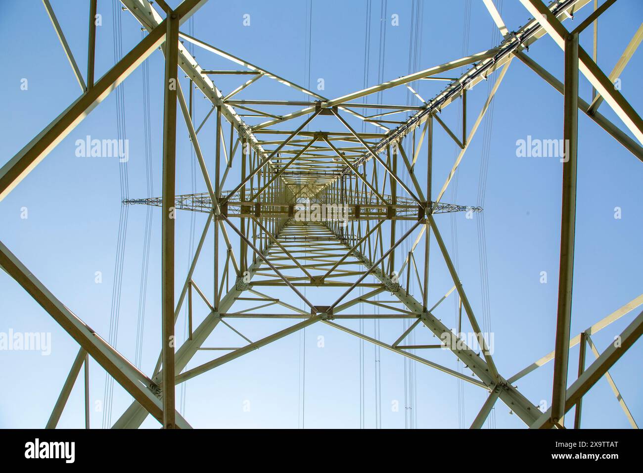 detail of electricity pylon under clear blue sky as energy symbol Stock ...