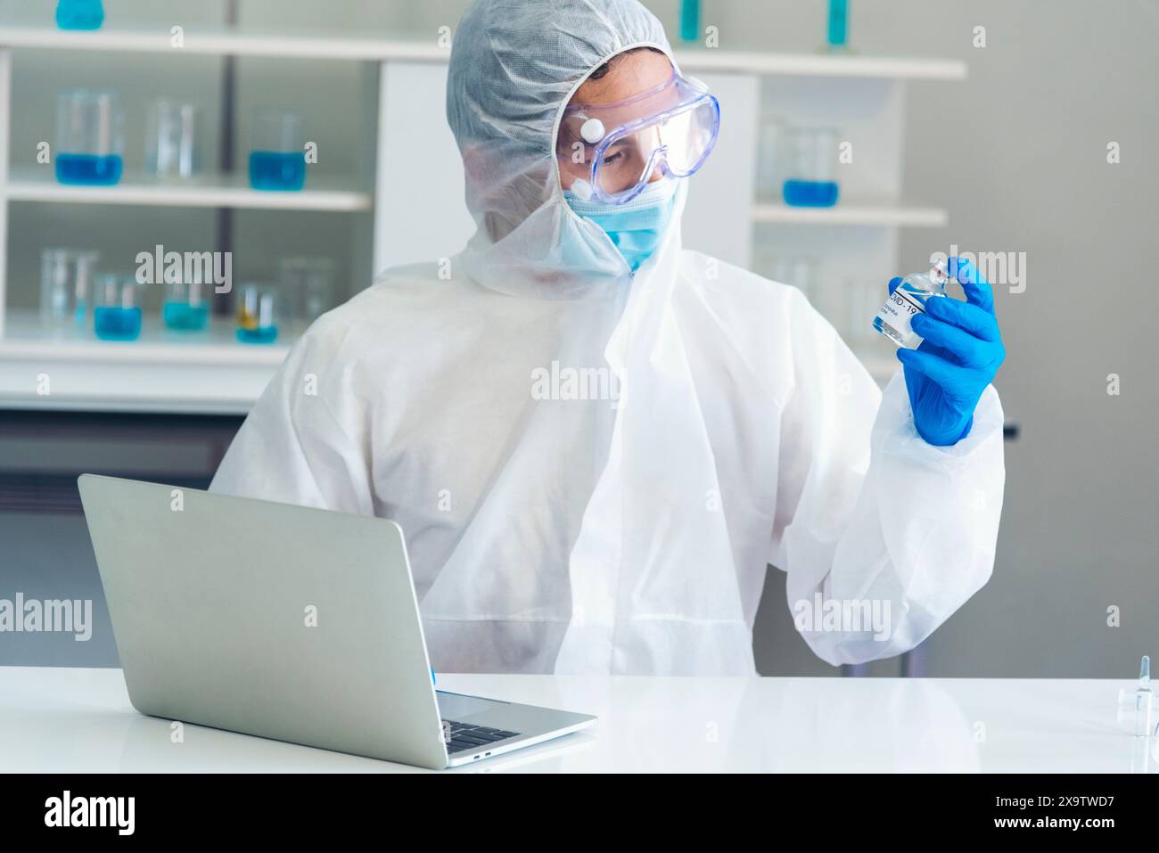 Scientist covid-19 virus chemistry research experiment biotech antibody ...