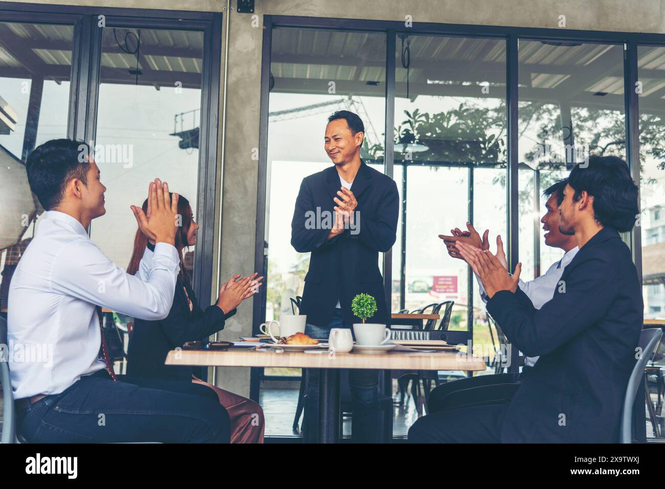 Business partner team meeting working together on office desk. Group of ...