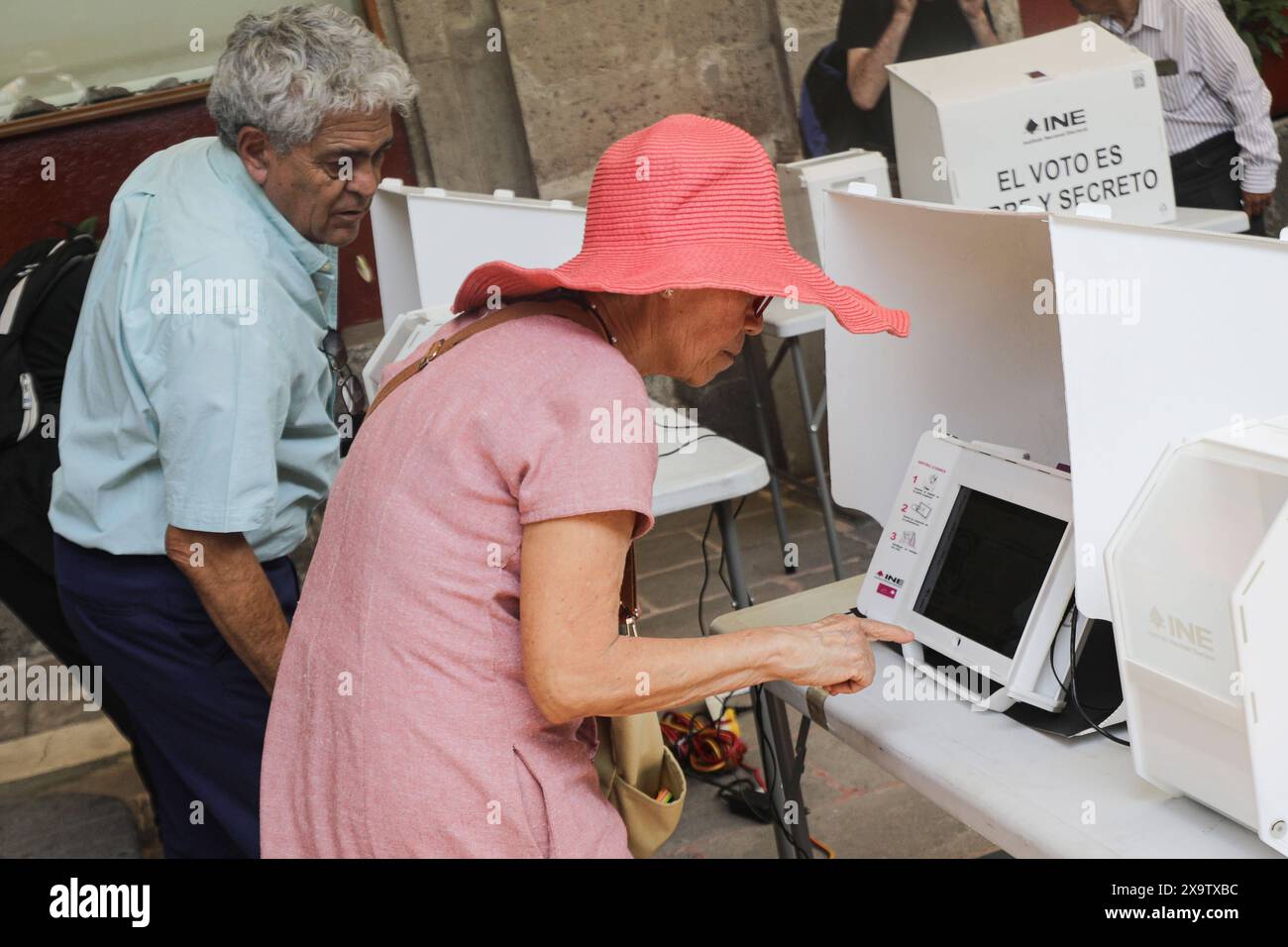 2024 Mexico General Elections A Mexican citizen casting their vote at a ...