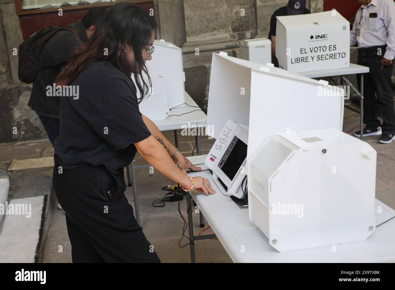 2024 Mexico General Elections A Mexican citizen casting their vote at a ...