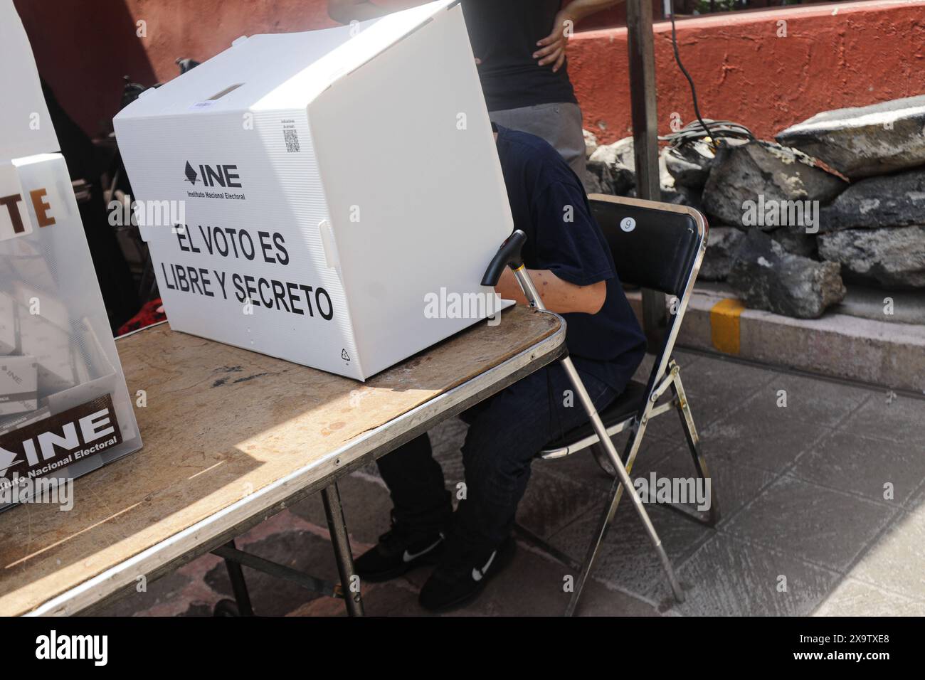 2024 Mexico General Elections A Mexican citizen casting their vote at a ...
