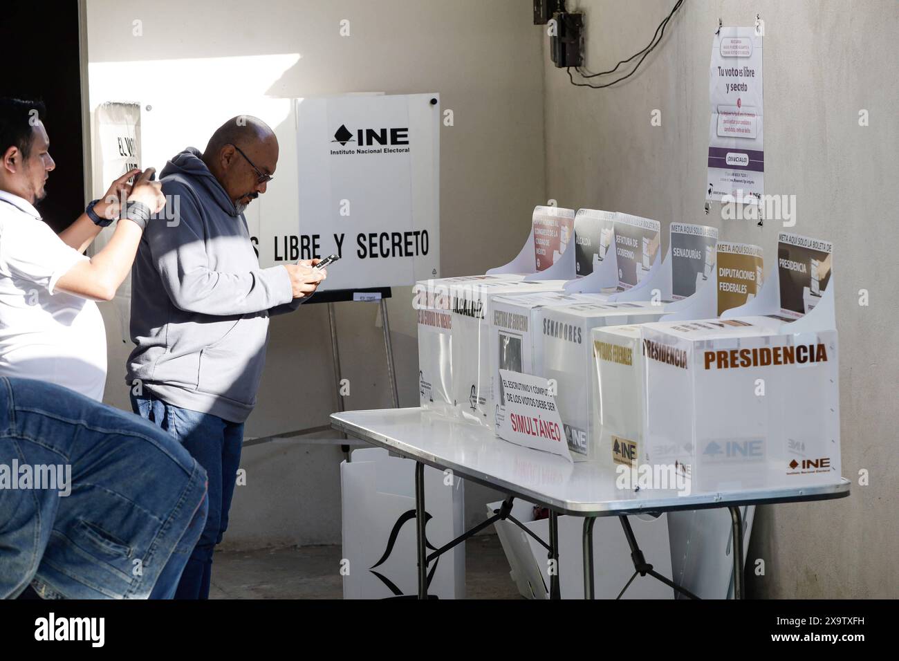 2024 Mexico General Elections A Mexican citizen casting their vote at ...