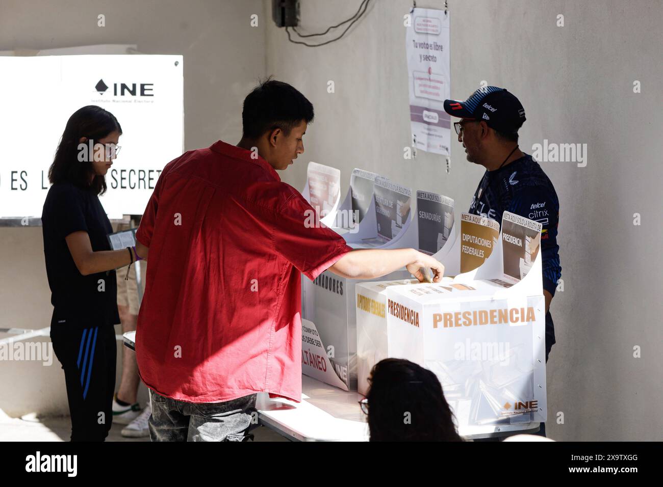 2024 Mexico General Elections A Mexican citizen casting their vote at ...