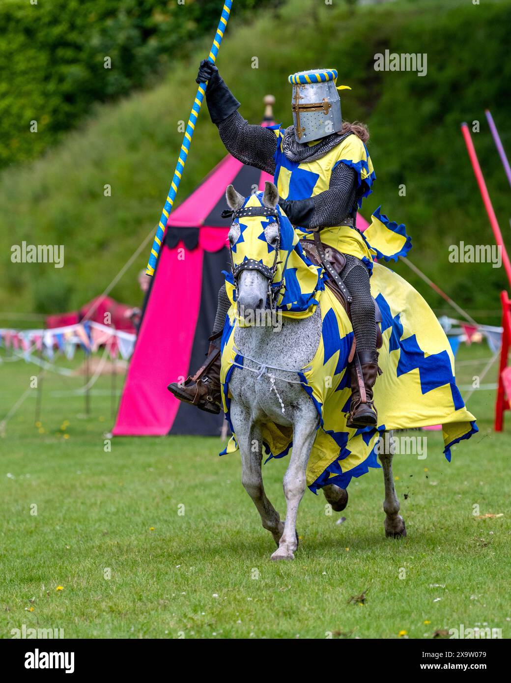 Sir David riding his warhorse at The Joust, Cardiff, UK. 15th June 2019 ...