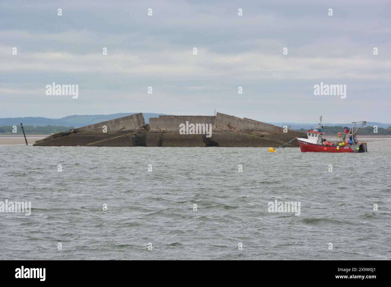 The Phoenix Caisson section of a Mulberry Harbour in Langstone Harbour ...